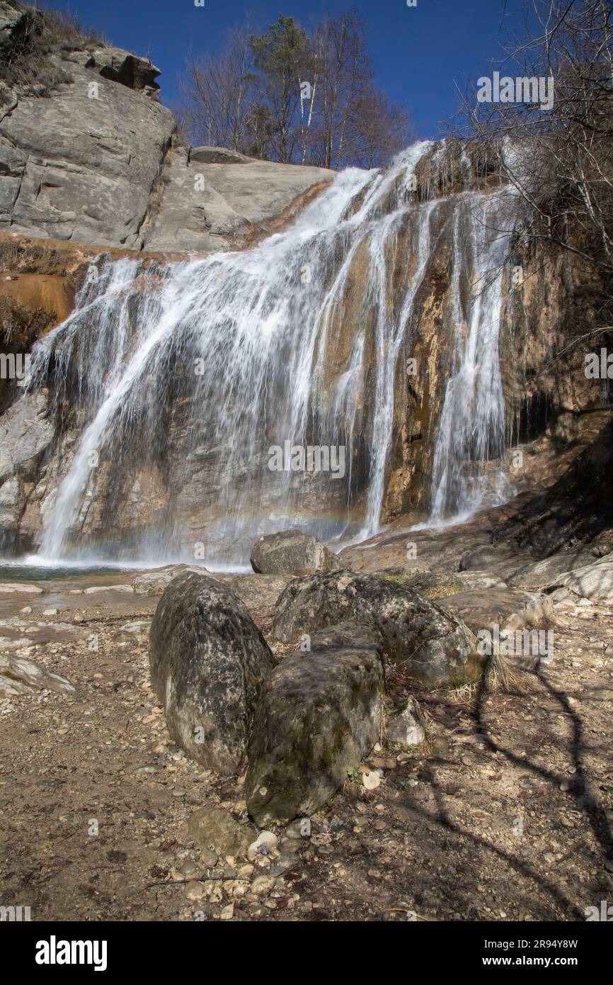 Landscape showing a waterfall Salt del Moli waterfall in Vidra town in ...