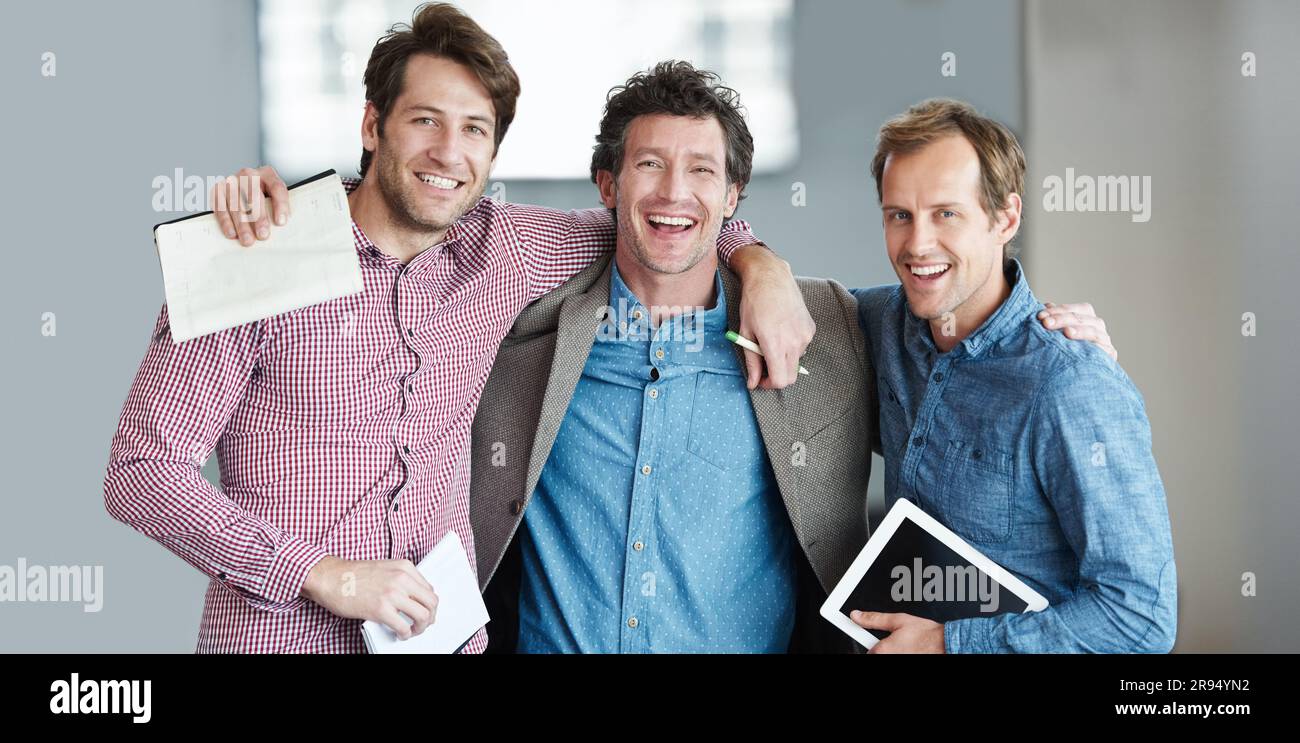 Portrait, teamwork or happy developers hug for motivation for support ...