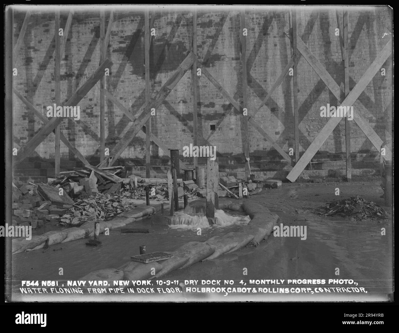 Monthly Progress Photo, Dry Dock No. 4, Water Flowing from Pipe in Dock ...