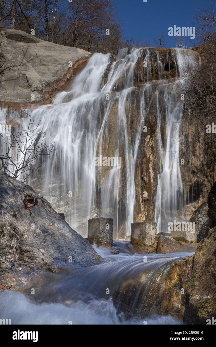 Landscape showing a waterfall Salt del Moli waterfall in Vidra town in ...