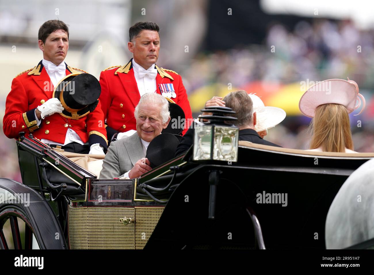 The carriage carrying King Charles III, Queen Camilla, the Earl of ...