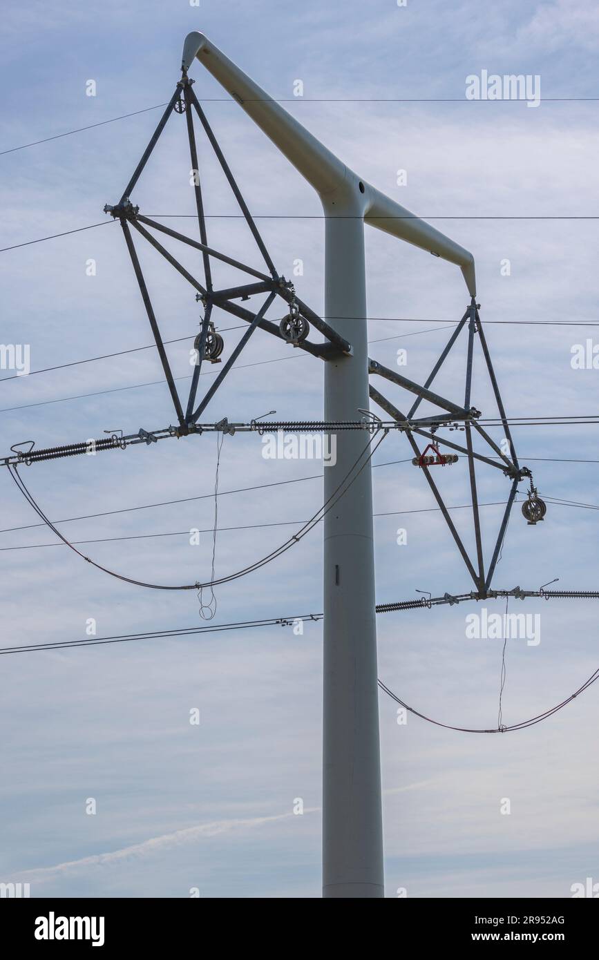 The process of pulling the cables through the diamond insulater sets ...