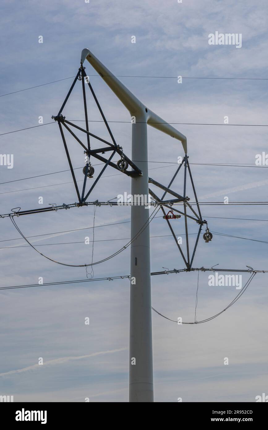 The process of pulling the cables through the diamond insulater sets ...