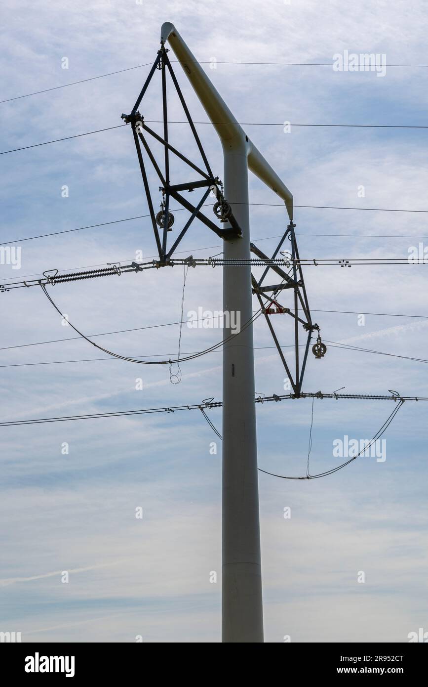 The process of pulling the cables through the diamond insulater sets ...