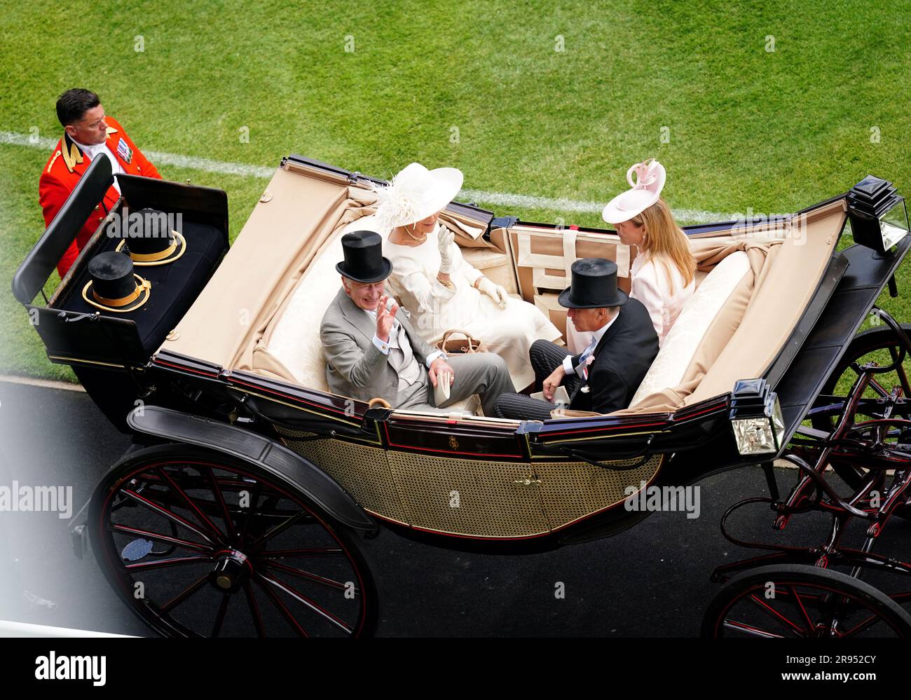 The carriage carrying King Charles III, Queen Camilla, The Earl of ...