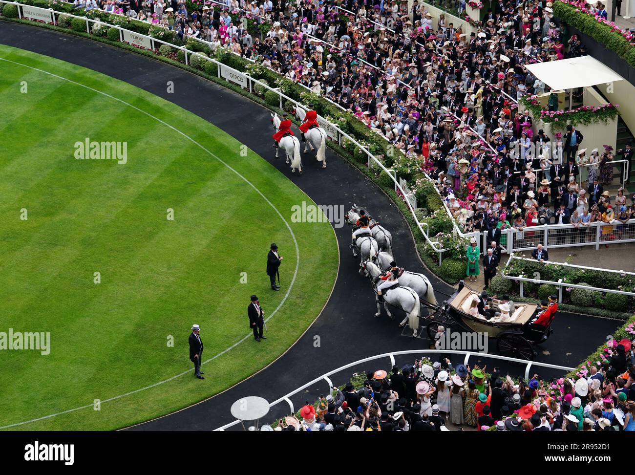 The carriage carrying King Charles III, Queen Camilla, The Earl of ...