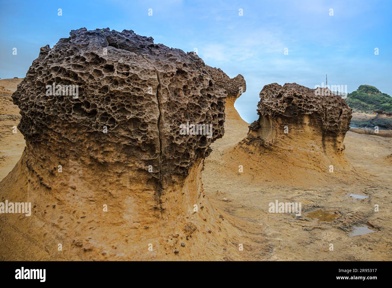 A landscape in Yehliu Geopark with some honeycombed rock formations ...