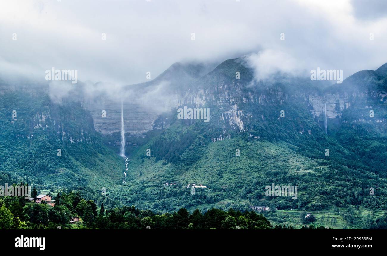 Rain and fog swirl around the World Natural Heritage site of Jinfo ...
