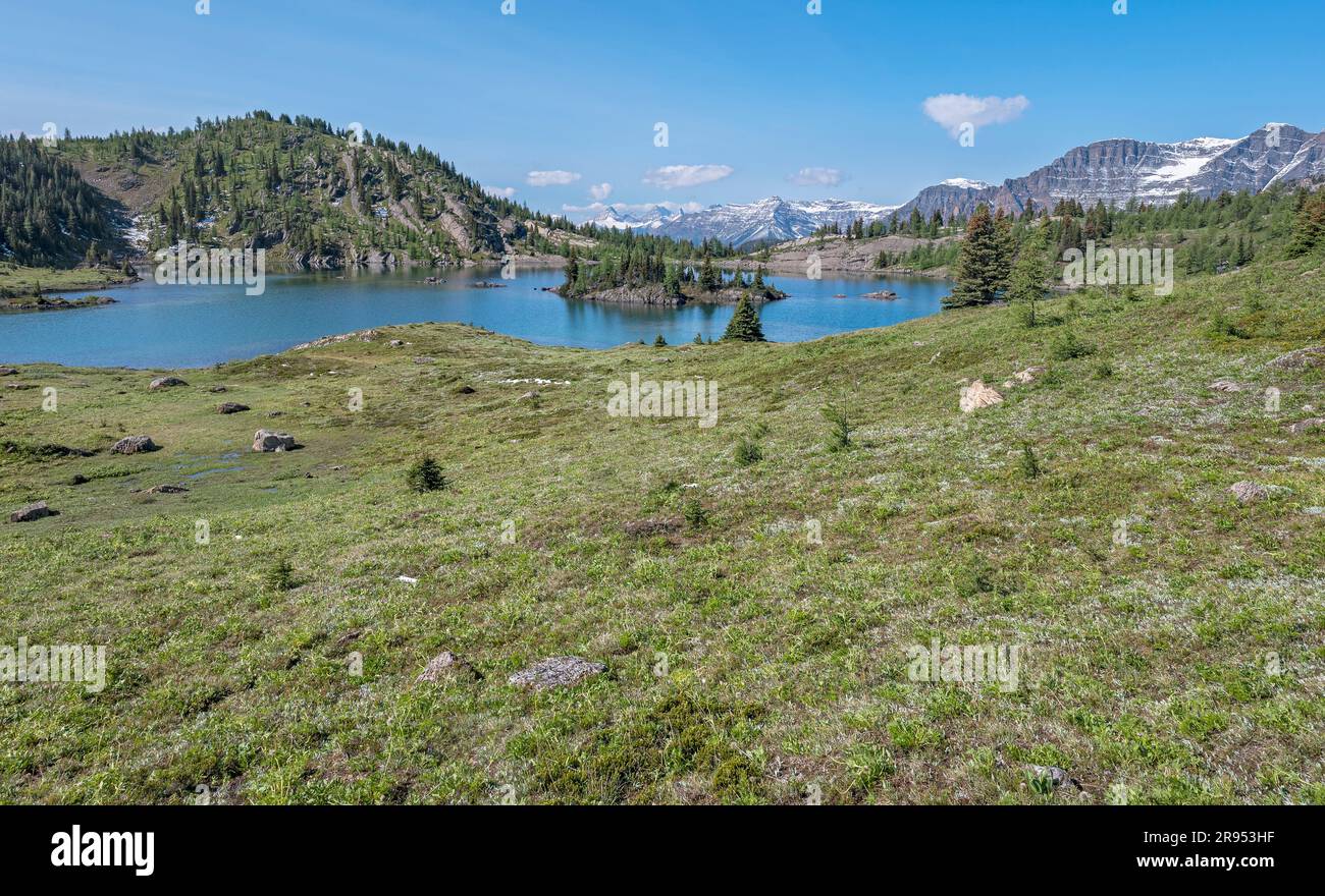 Rock Isle Lake in the high alpine of Sunshine Meadows on the border of ...