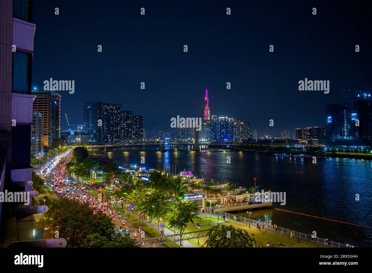 Nighttime view of Saigon River, Ba Son bridge and Vinpearl Landmark 81 ...