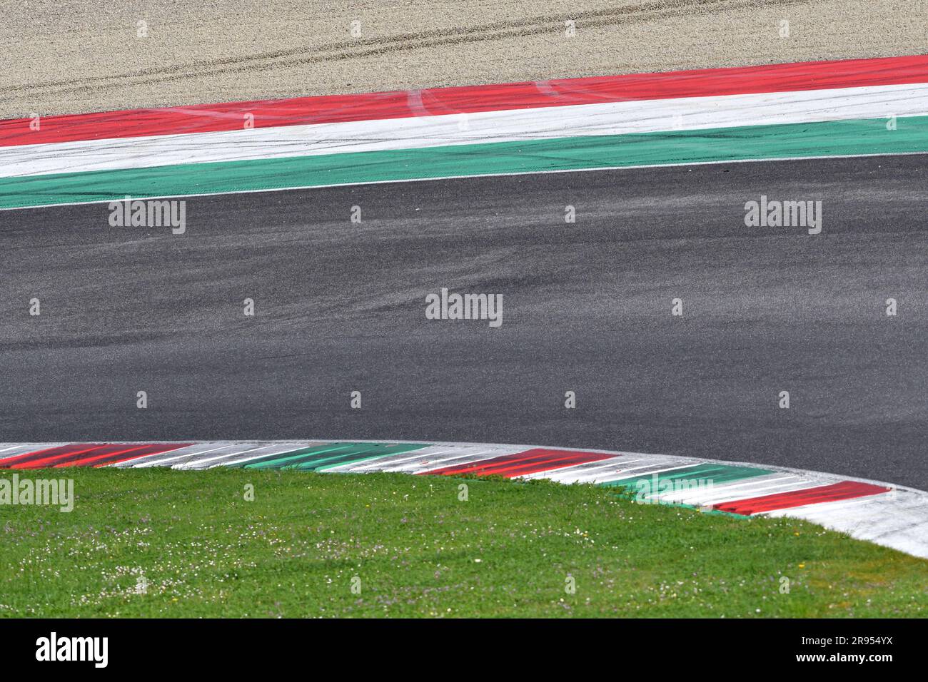 colored curbs on a racing track Stock Photo - Alamy