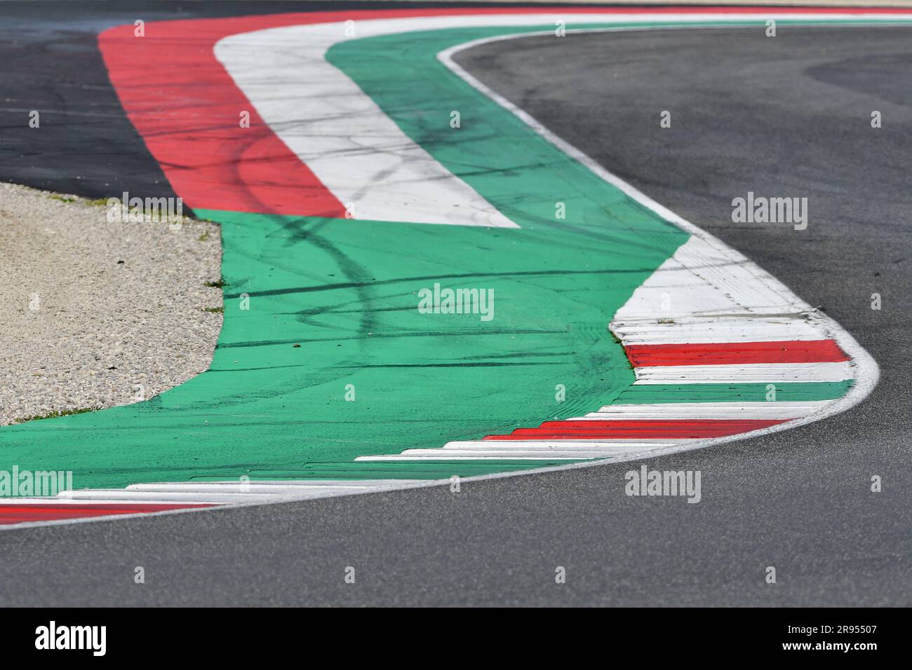 colored curbs on a racing track Stock Photo - Alamy