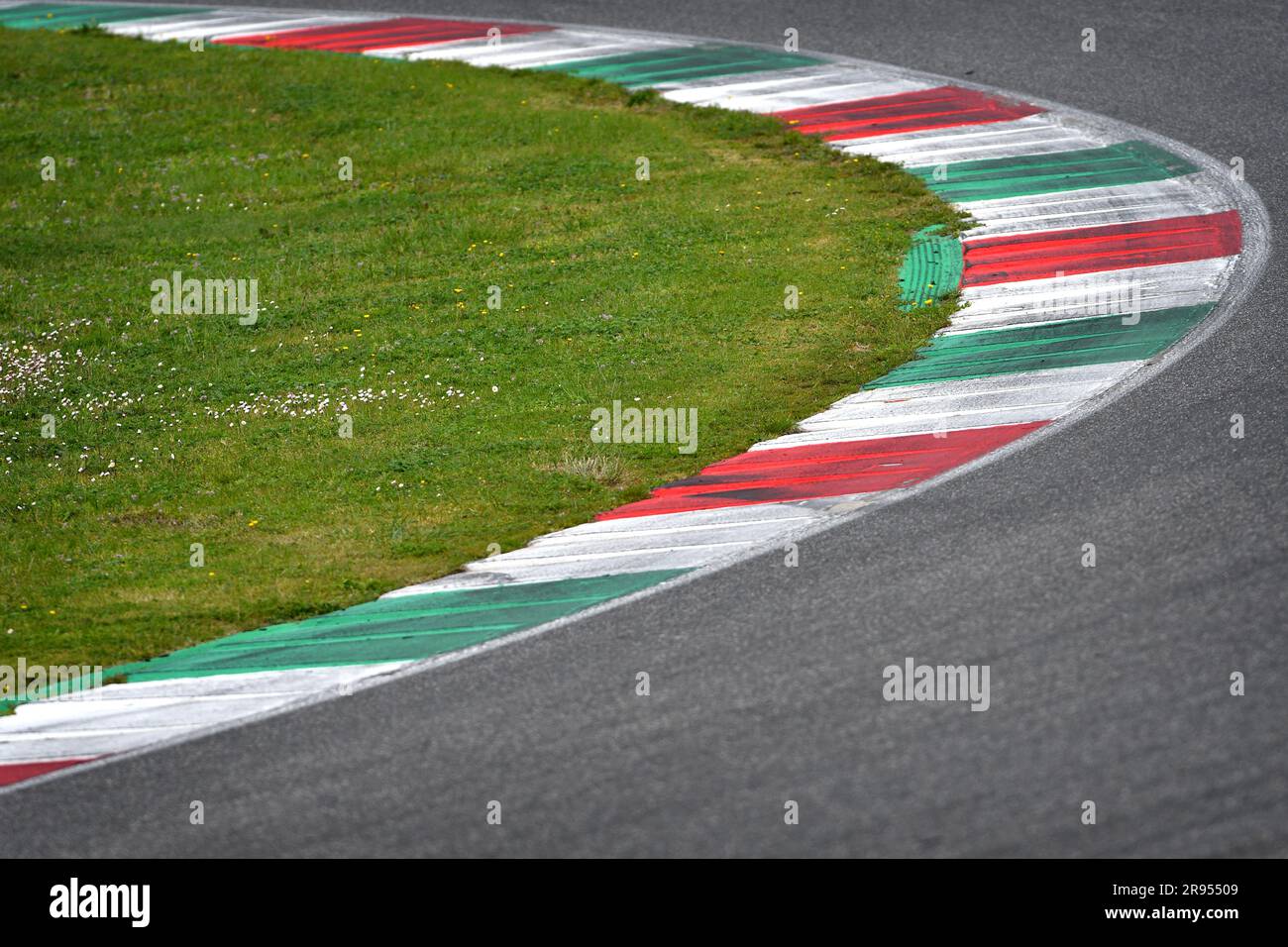 colored curbs on a racing track Stock Photo - Alamy