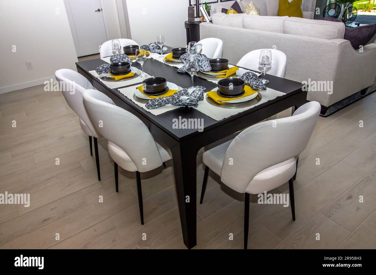 Dining Area Table With Six Place Settings Stock Photo - Alamy