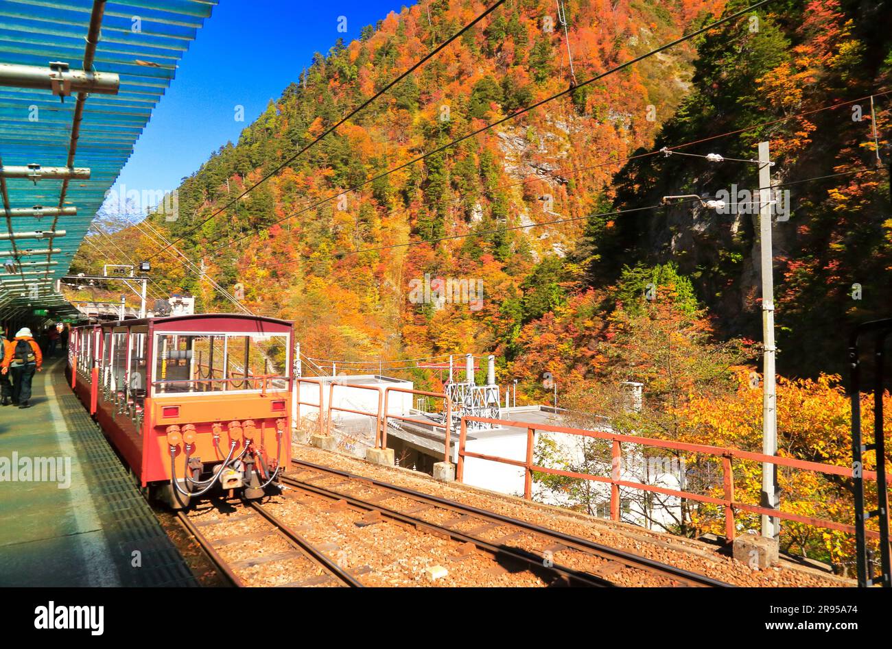 Kurobe Gorge Railway in Autumn Leaves Stock Photo - Alamy