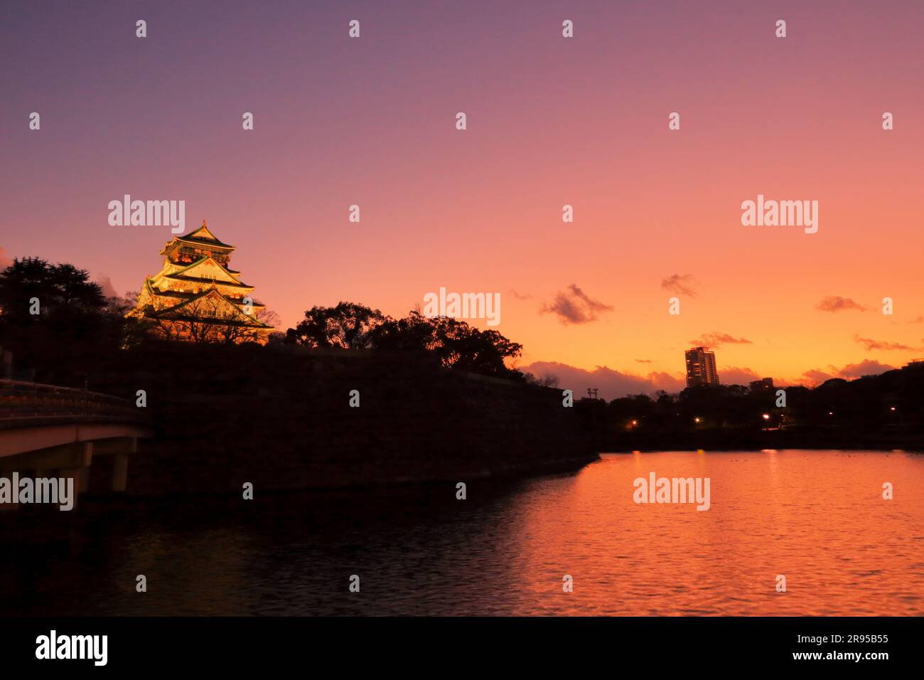Osaka Castle at sunset Stock Photo - Alamy