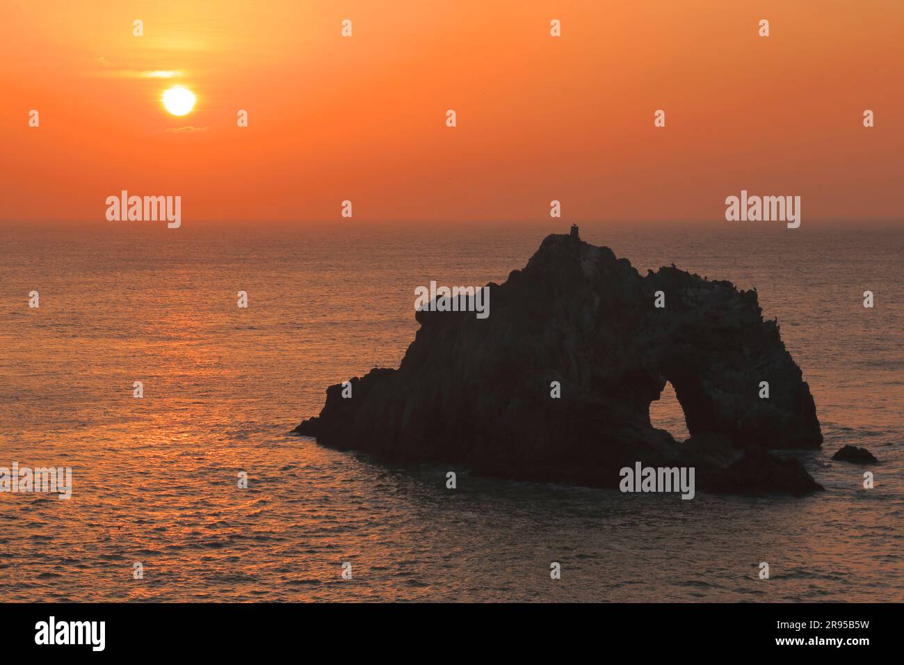 Stone gate at sunrise Stock Photo - Alamy