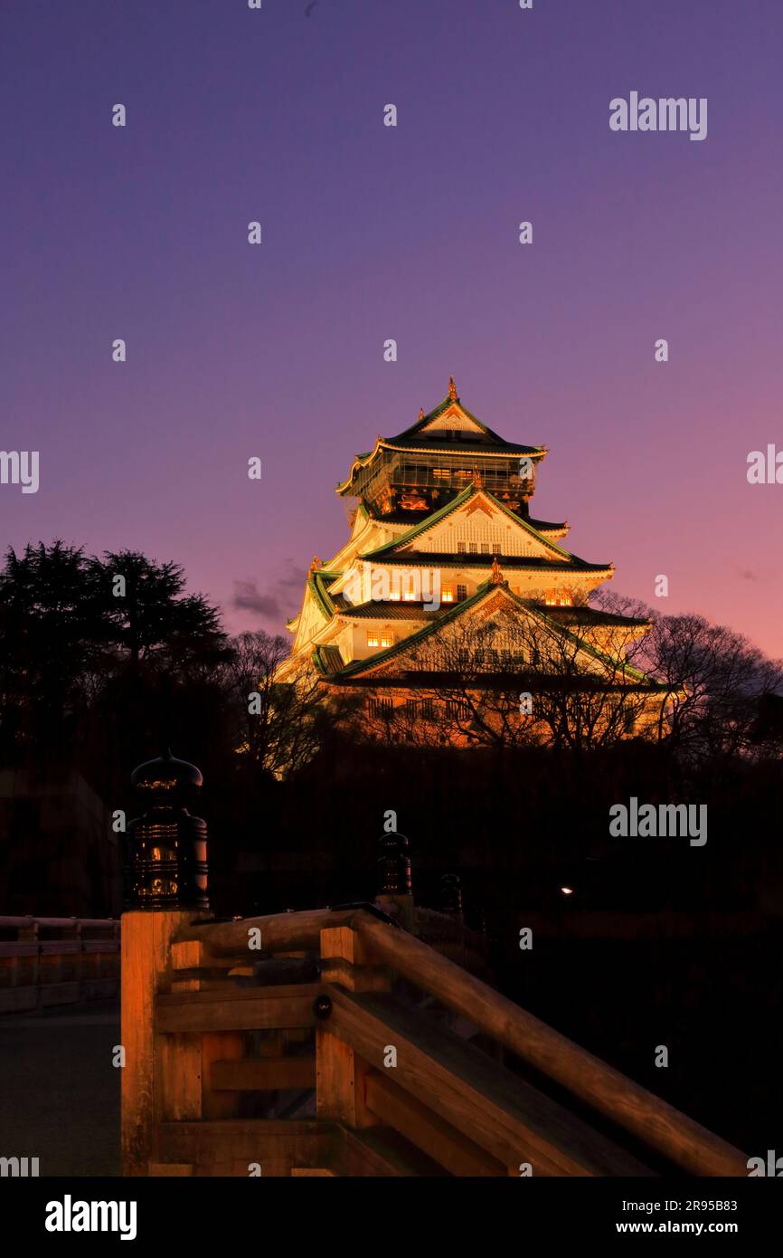 Osaka Castle at sunset Stock Photo - Alamy