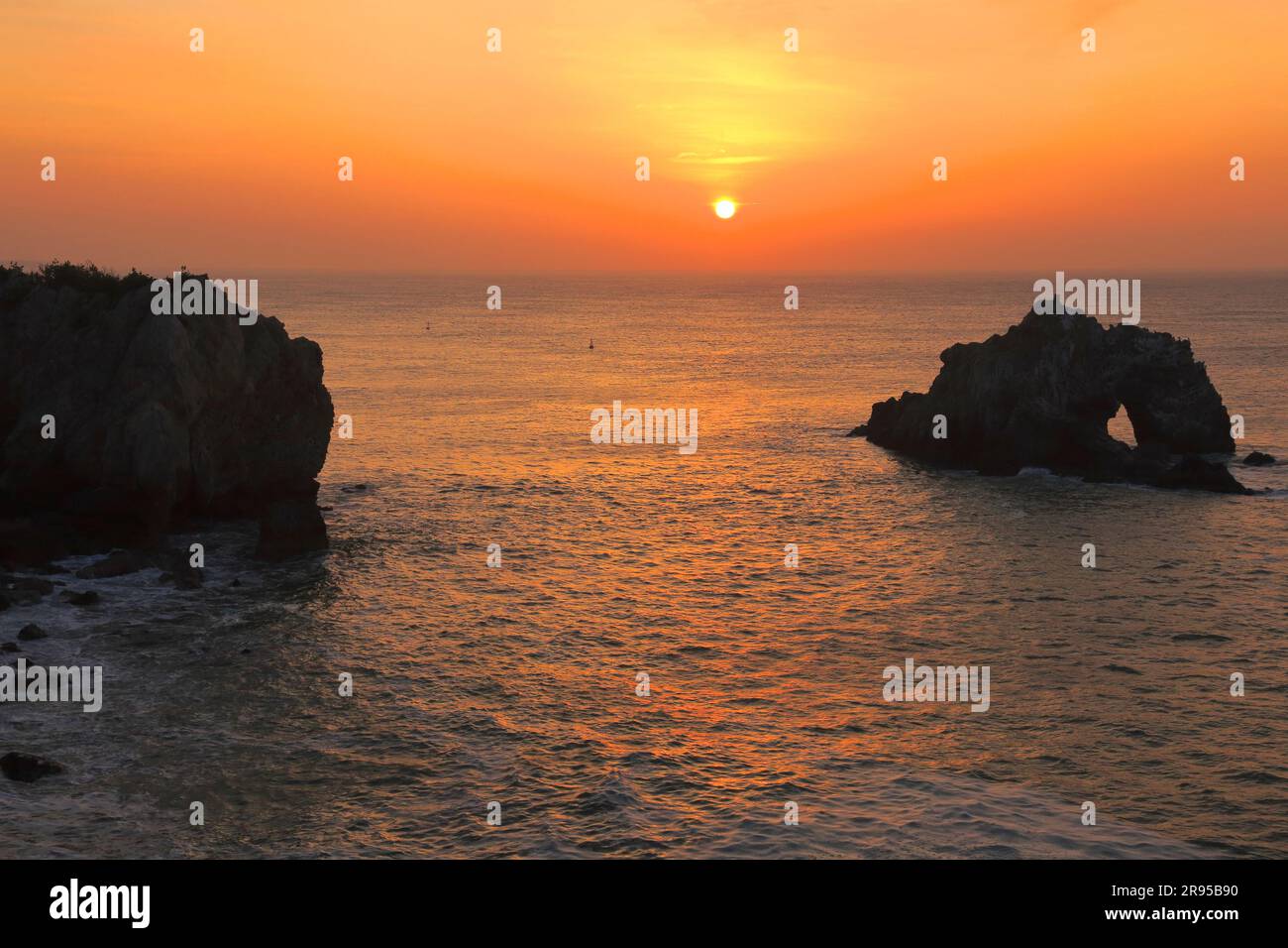 Stone gate at sunrise Stock Photo - Alamy