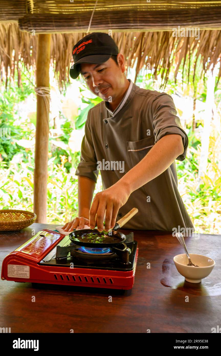 Chef and tutor demonstrates how to cook authentic Vietnamese Hoi An ...