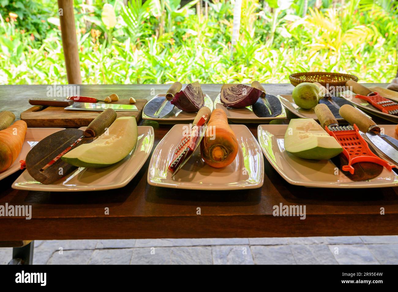 Local ingredients and kitchen tools are lined up for cooking at the Red ...