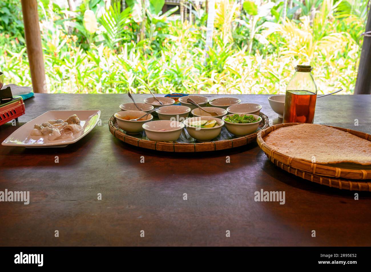 Local seafood salad ingredients are lined up for cooking at the Red ...