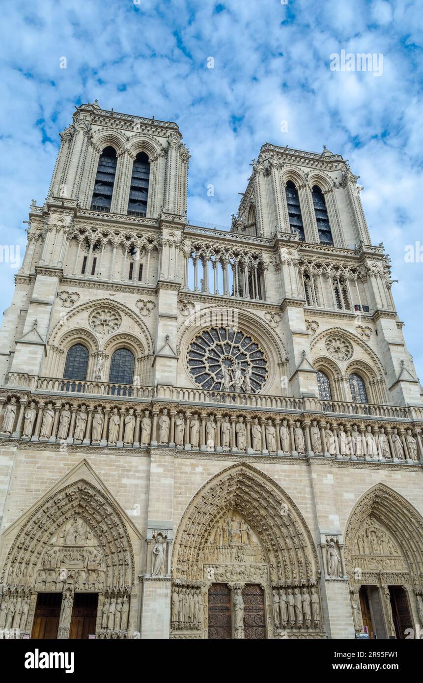 Facade of the famous gothic cathedral of Notre-Dame de Paris, France ...