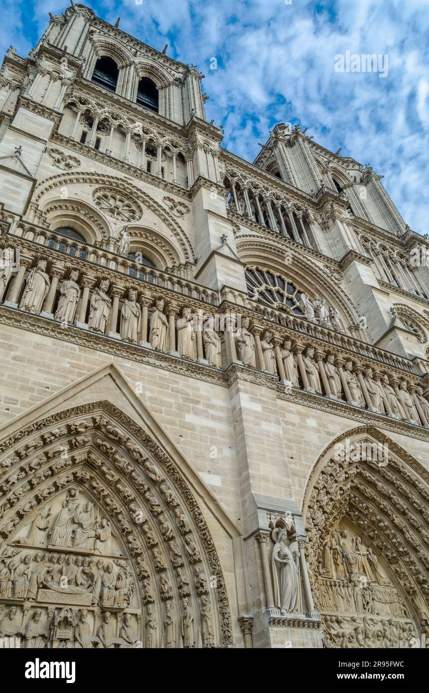 Facade of the famous gothic cathedral of Notre-Dame de Paris, France ...
