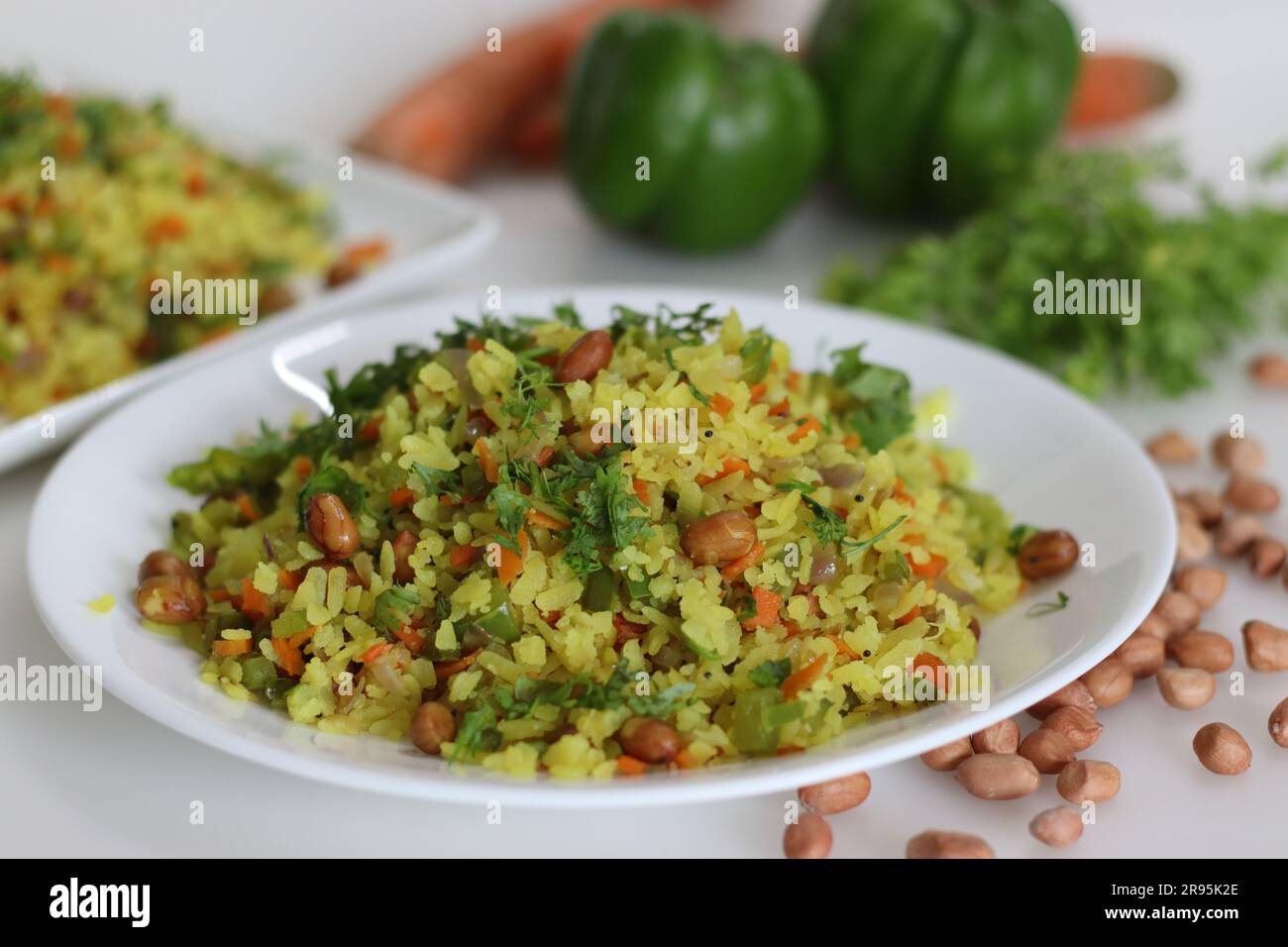 Vegetable Poha is a quick breakfast or snack made of beaten rice or ...
