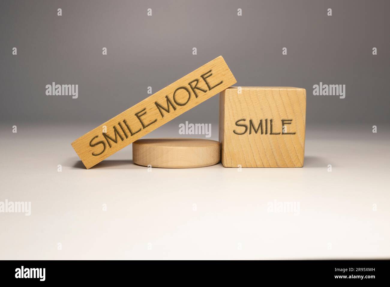smile more sentence was written. Wooden concept studio shoot Stock ...