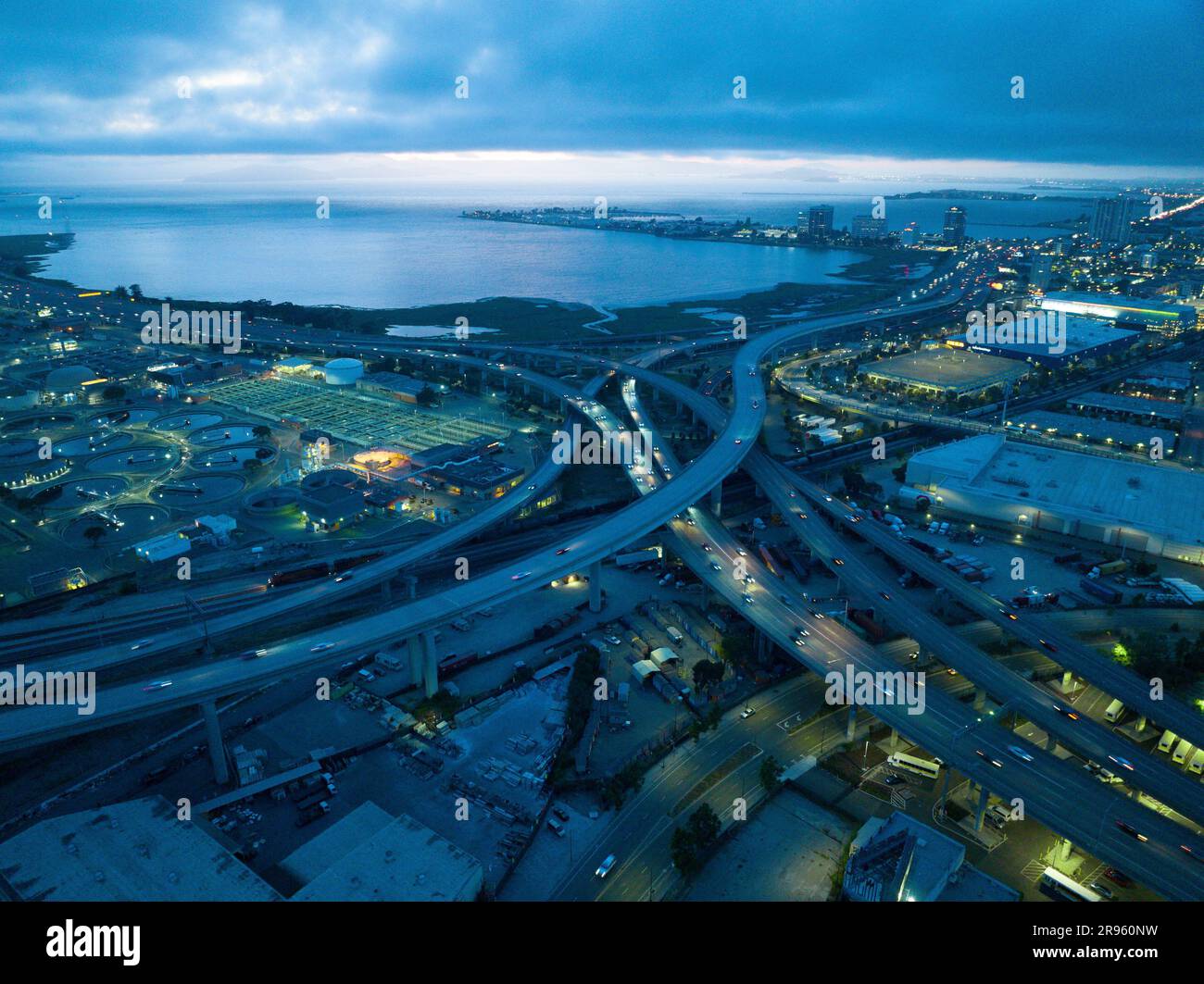 A view of a grand highway illuminated by evening lights. Emeryville ...