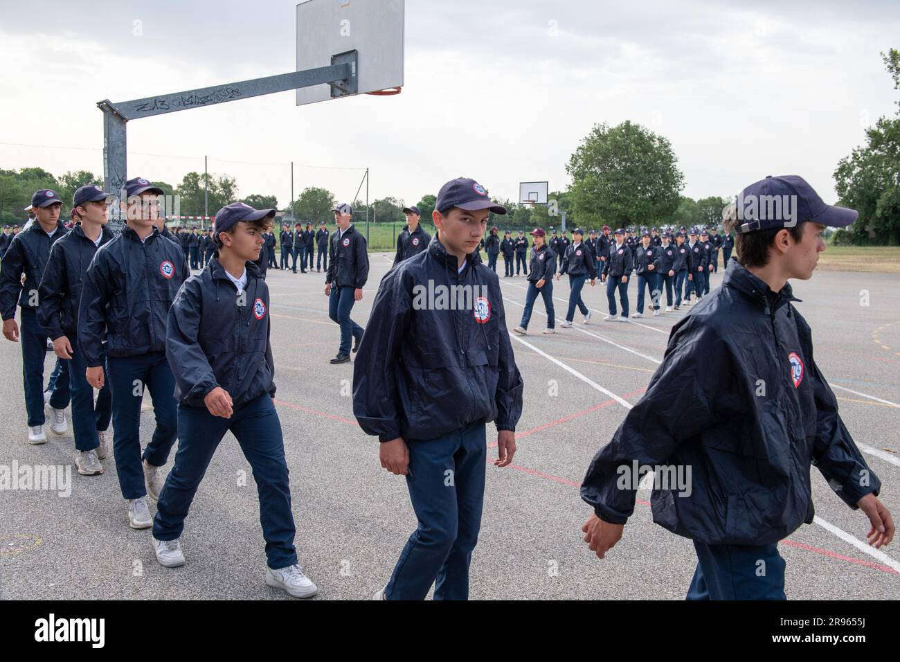 Attendees take part during the ceremony. 168 young people come together ...