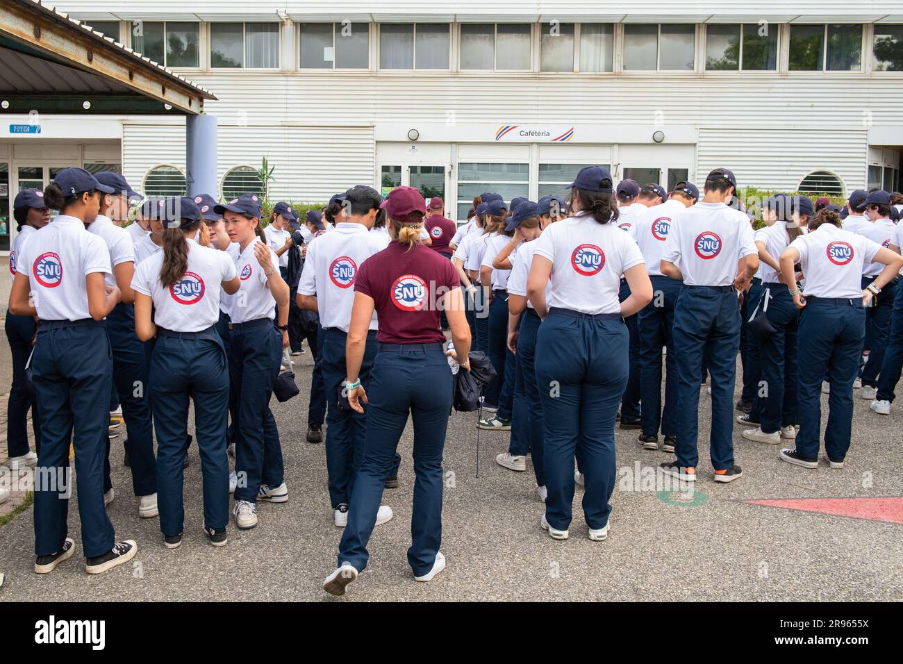 Attendees take part during the ceremony. 168 young people come together ...