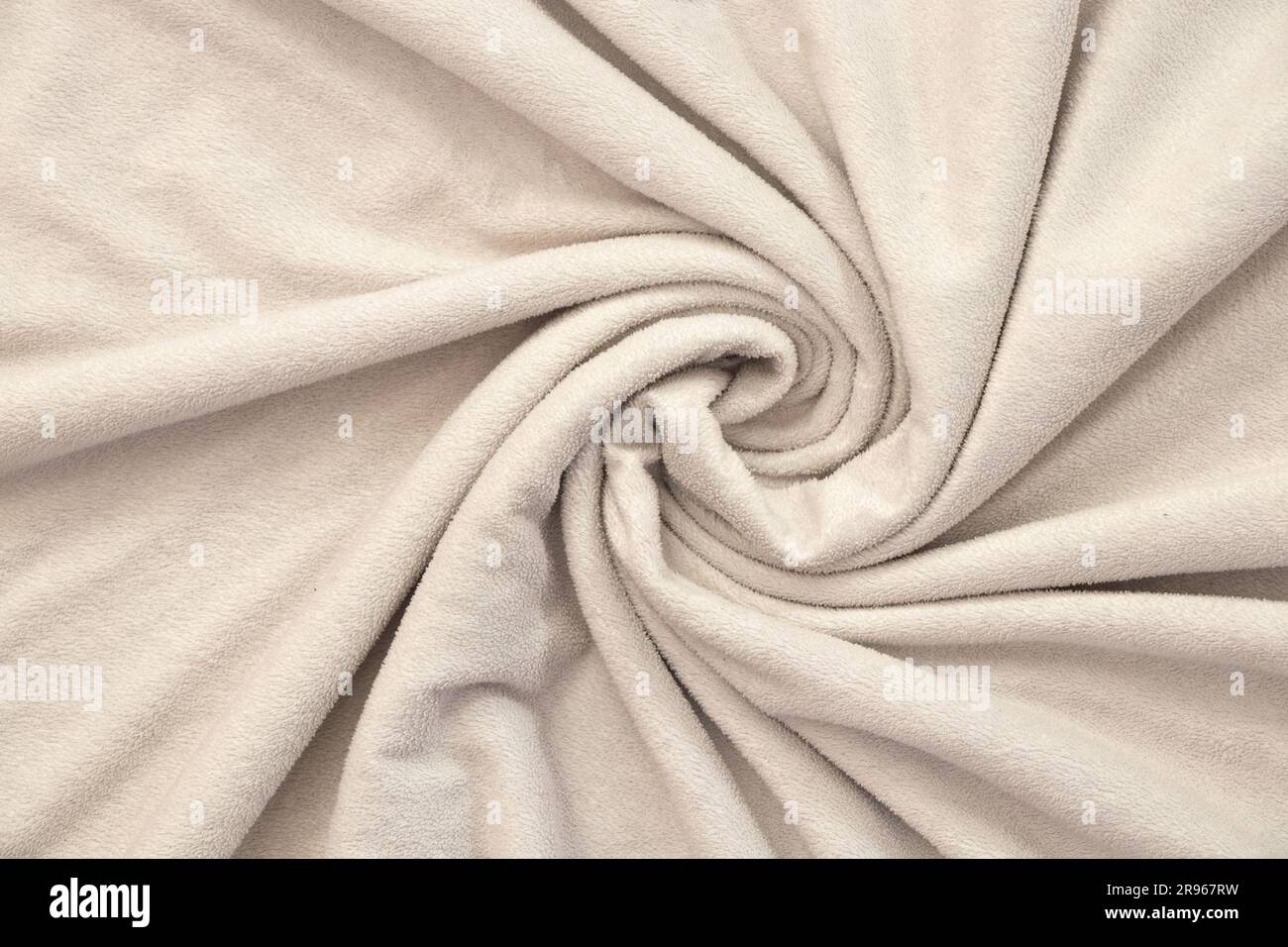 plain white wrinkled fabric close-up as a background, fabric texture ...