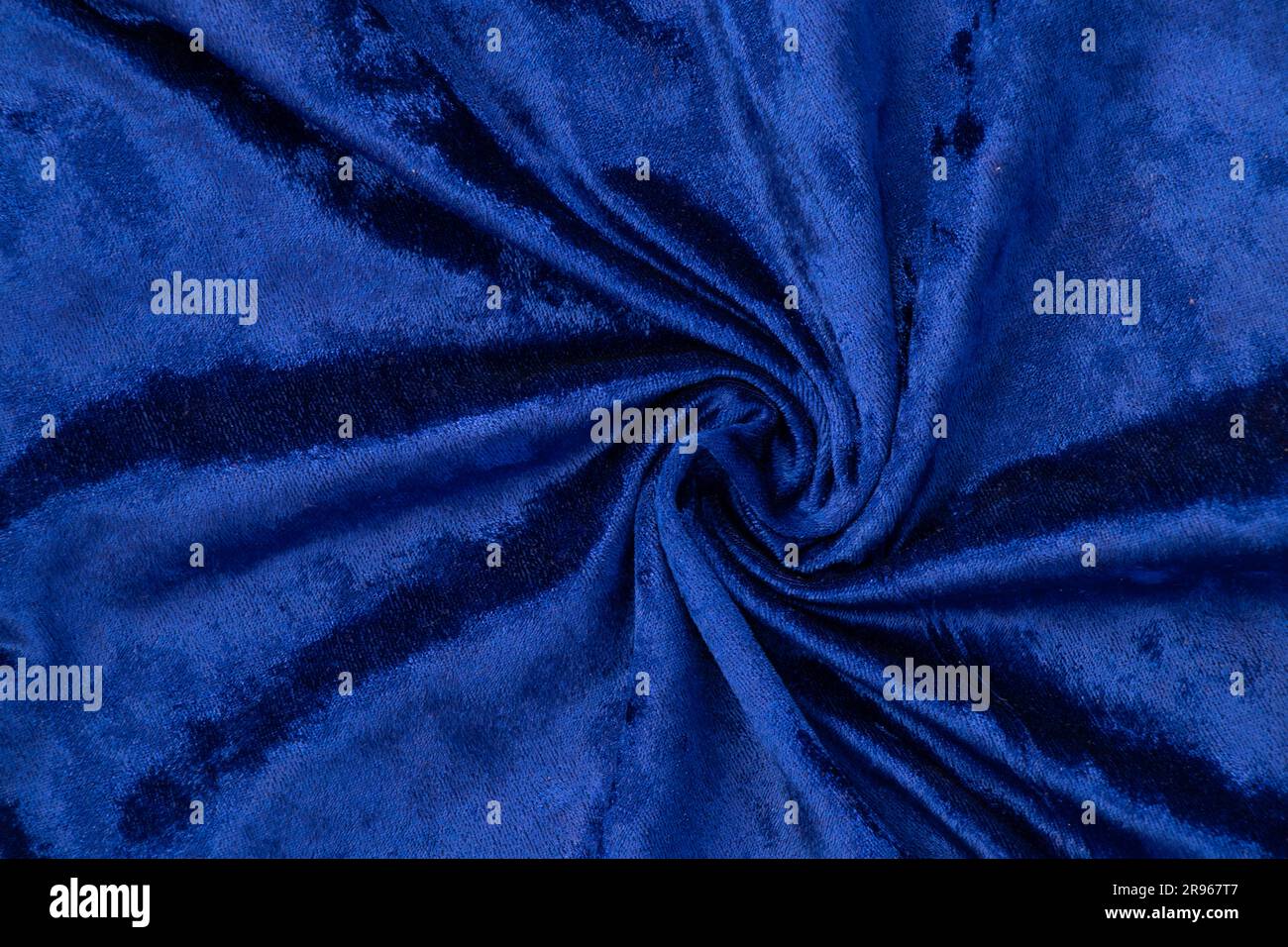plain blue wrinkled fabric close-up as background, fabric texture Stock ...