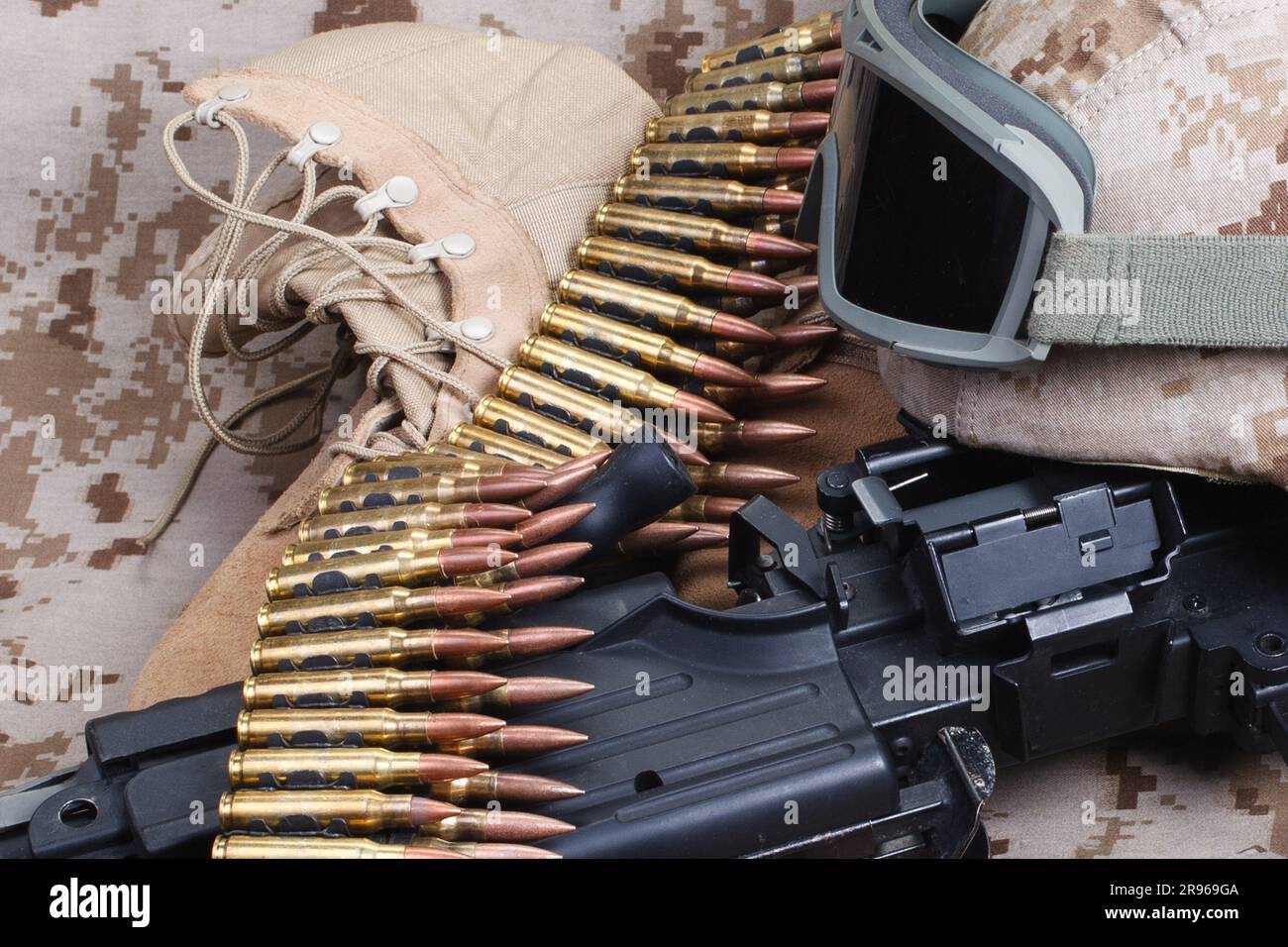 US MARINES. Machine gun with ammunition belt and armor helmet with ...