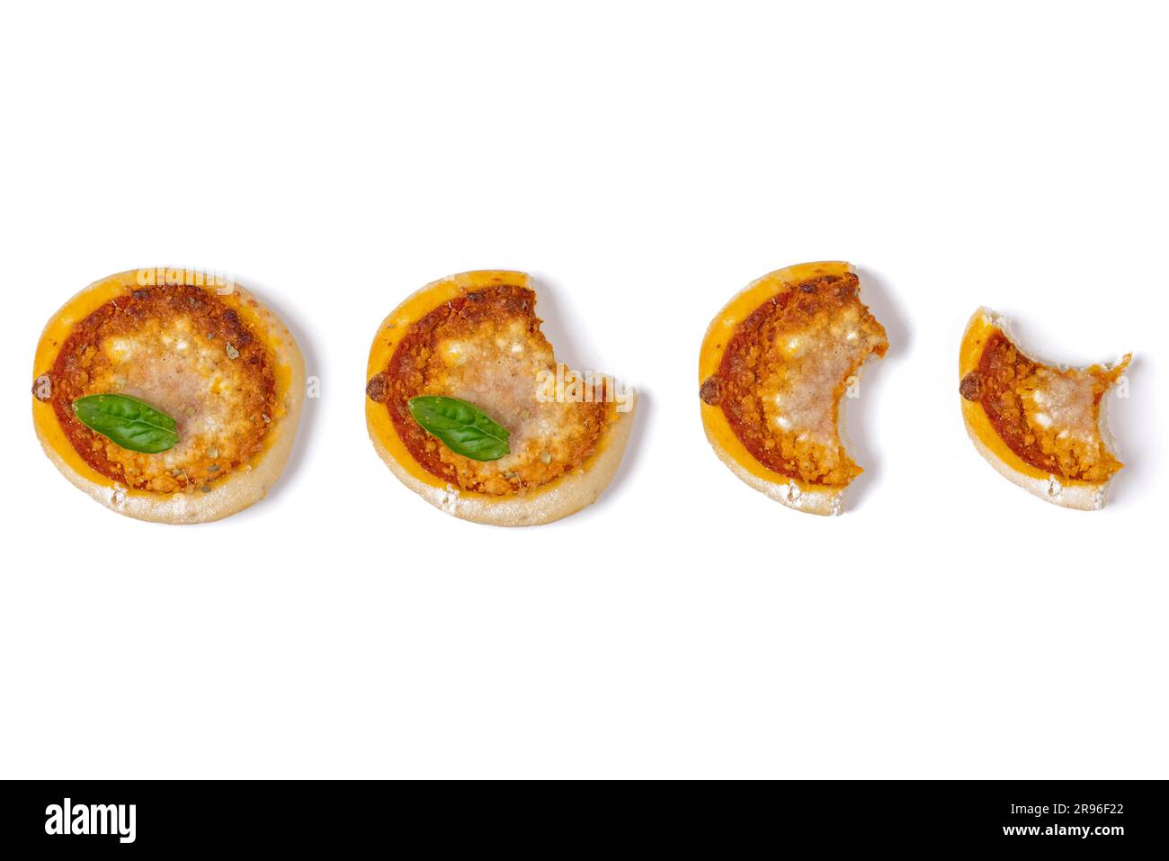 Mini Pizza Margherita, getting smaller by biting, food photography ...