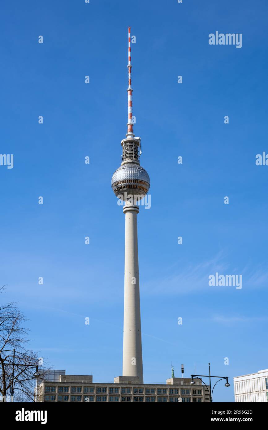 The television tower, Berlin's tallest building, with a bright blue sky ...