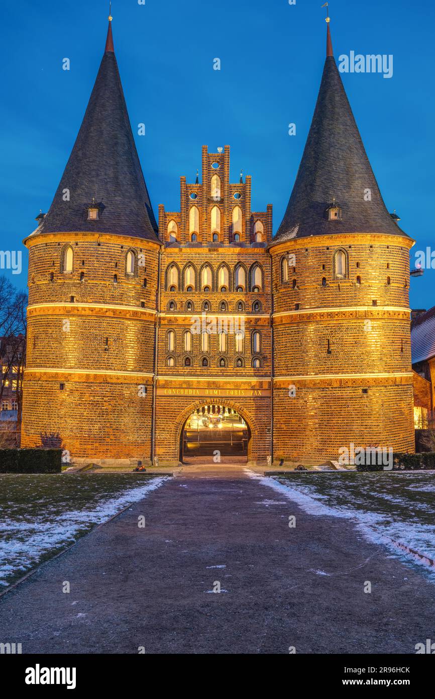 The famous Holsten Gate in Luebeck, Germany, by night Stock Photo - Alamy