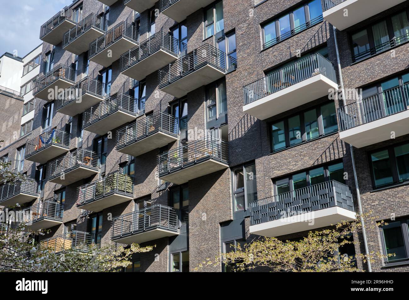 Modern grey apartment building with many balconies seen in Berlin ...