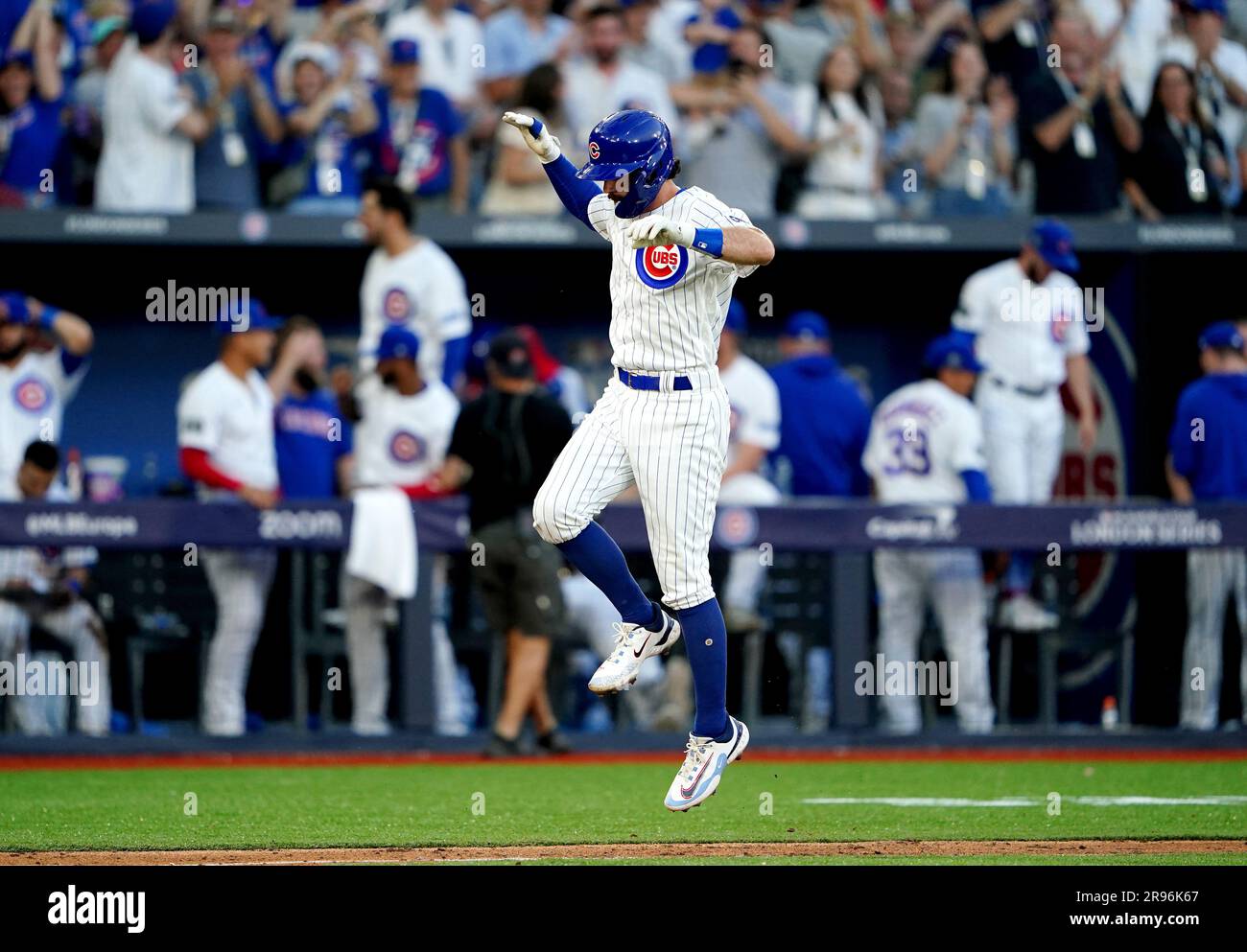 Chicago Cubs' Dansby Swanson celebrates a home run during the MLB ...