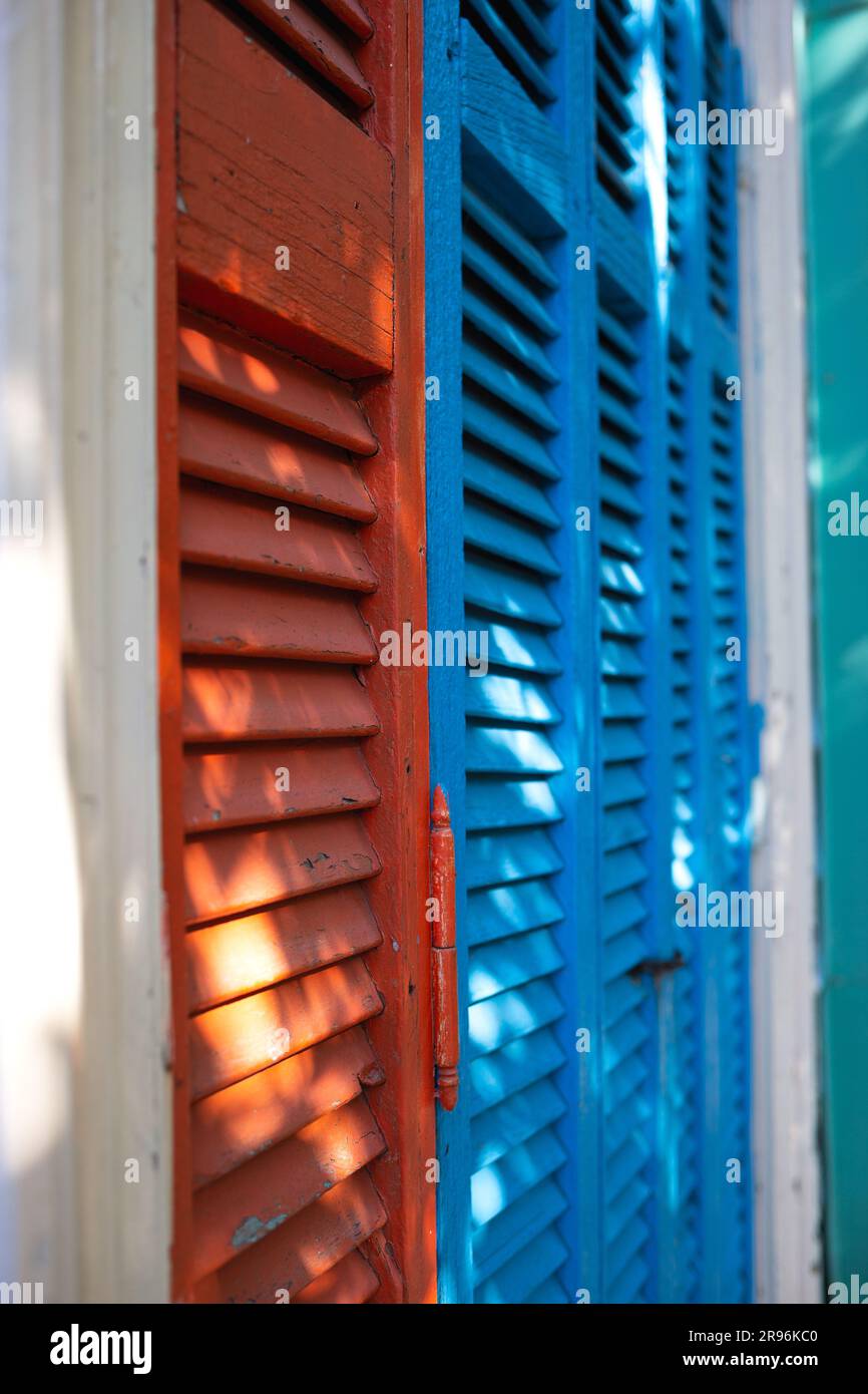 beautiful bright colorful and authentic red and blue shutters of ...