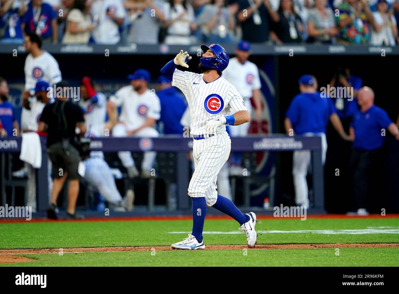 Chicago Cubs' Dansby Swanson celebrates a home run during the MLB ...