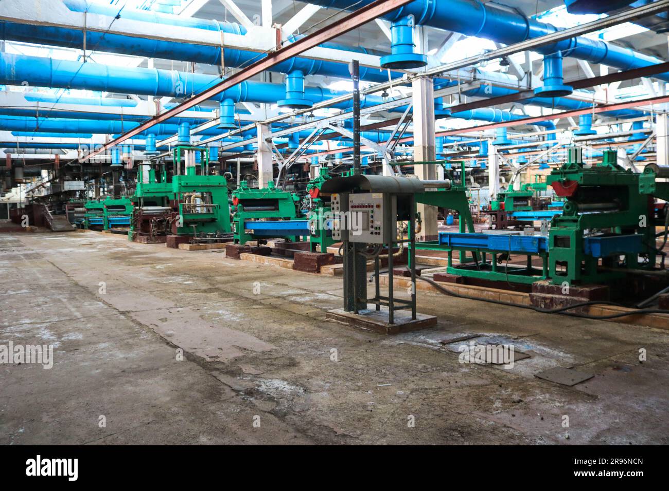 Beautiful metal industrial equipment of a production line at a machine ...