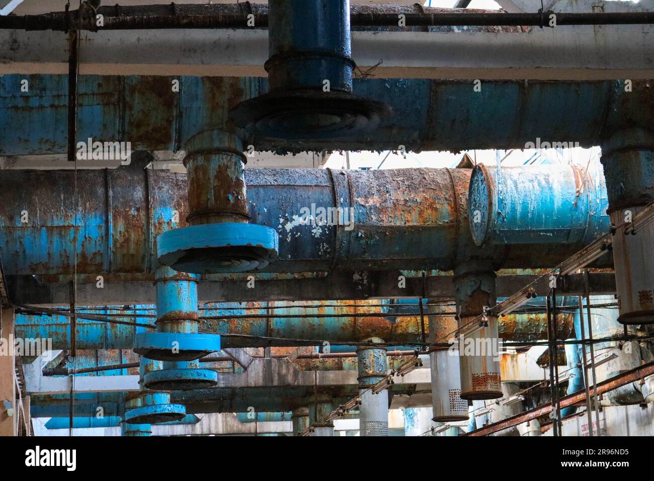 Old rusty peeling ceiling in a workshop at an industrial chemical ...