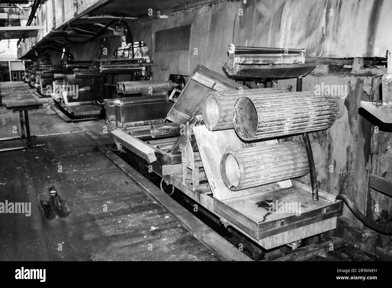 Large metal rollers rolls with teeth of the gears of the production ...