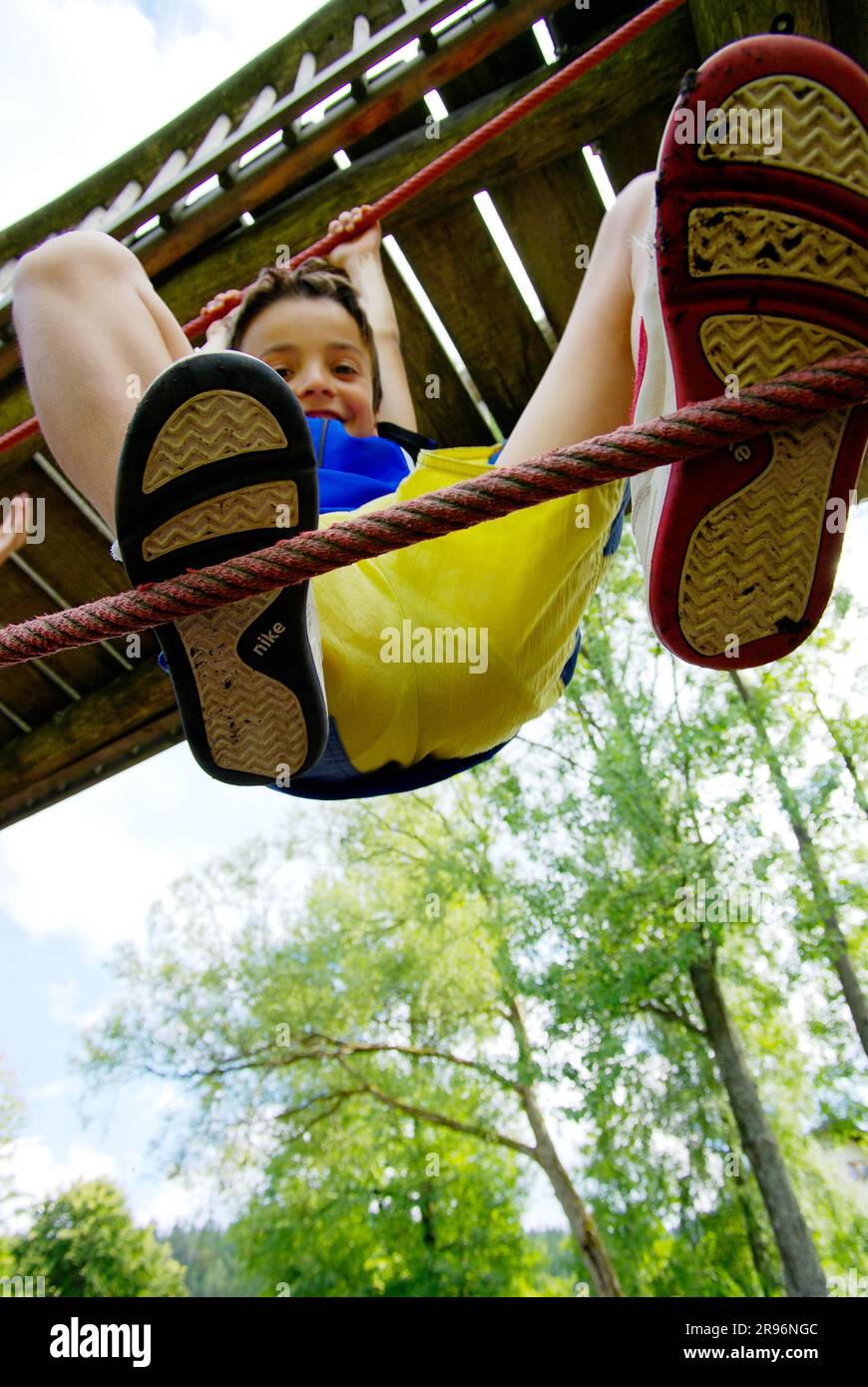 Boy climbing on playground, Bavarian Forest National Park, Bavaria, Germany Stock Photo - Alamy