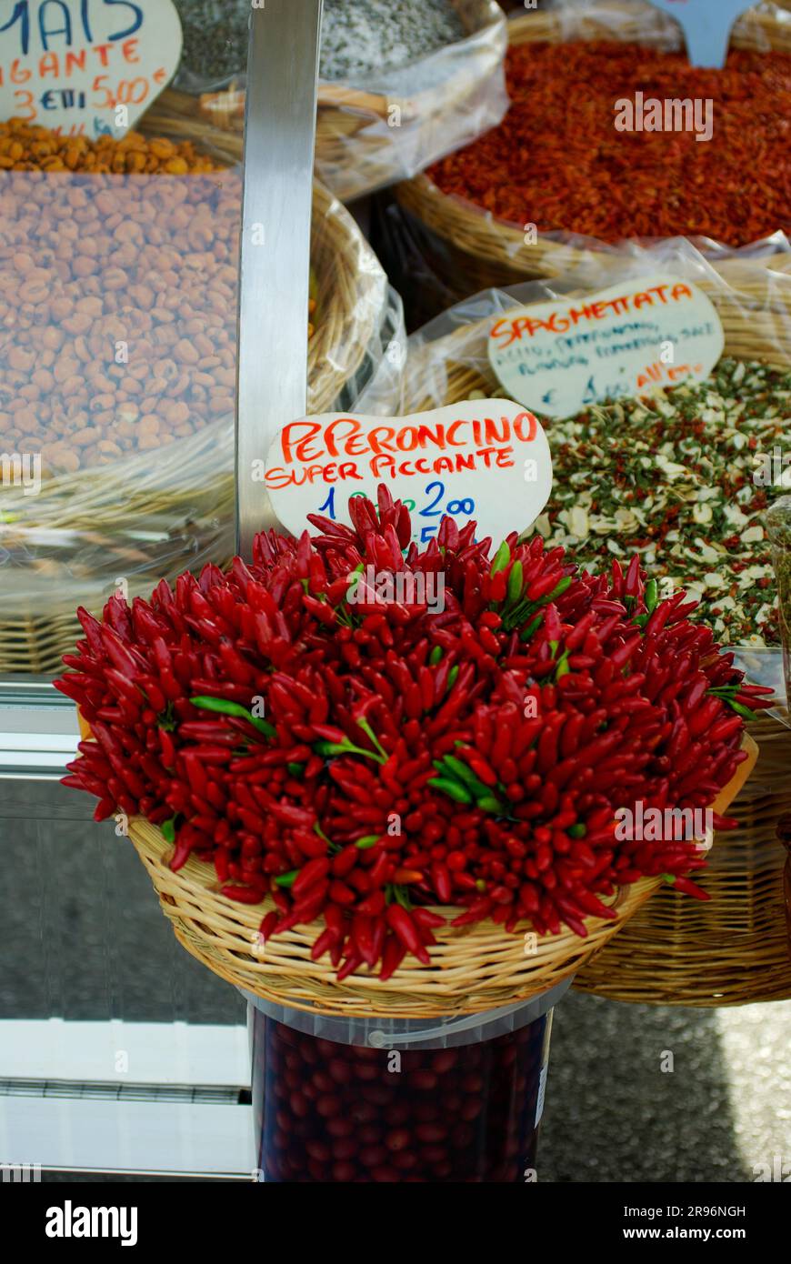 Market stall with chilli peppers, pepperoni, peppers, Italy Stock Photo ...