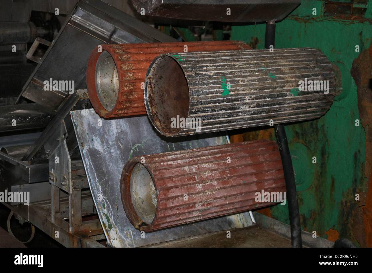 Large metal rollers rolls with teeth of the gears of the production ...