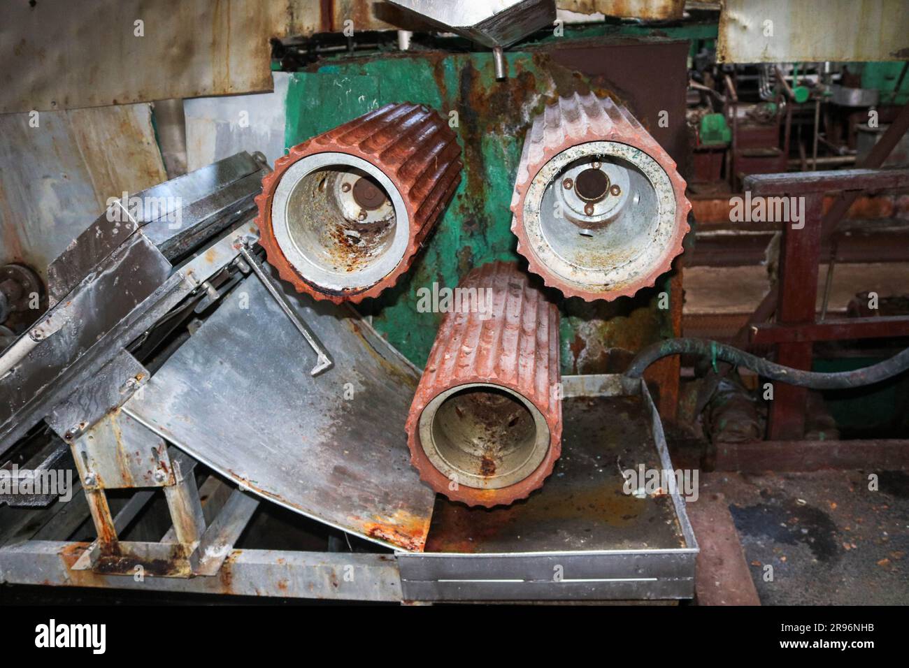 Large metal rollers rolls with teeth of the gears of the production ...
